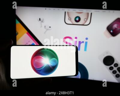 Apple Siri logo on the screen of iPad tablet. March 2021, San Francisco ...