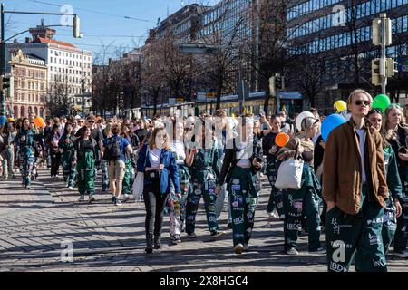 Aalto University School of Business students in student overalls ...