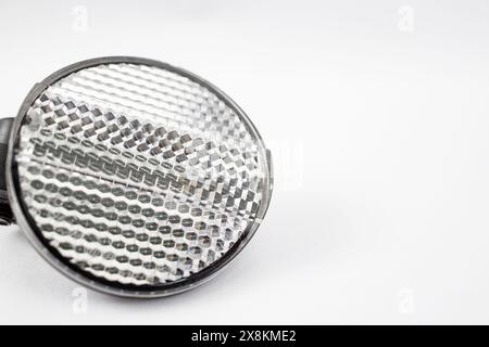 Bicycle reflector on a white background Stock Photo - Alamy