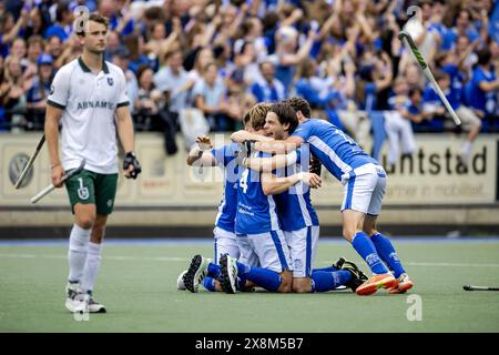 UTRECHT - The players of Kampong celebrate the championship during the ...