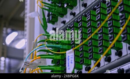 Close up of optical fiber switchboard hub in a server room. Stock ...
