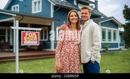 Real estate agent portrait with family getting new home. business ...