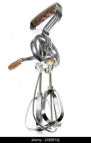 vintage rotary whisk isolated on white background Stock Photo - Alamy