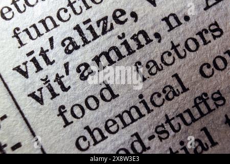 Word vitamin on dictionary page, macro close-up Stock Photo - Alamy