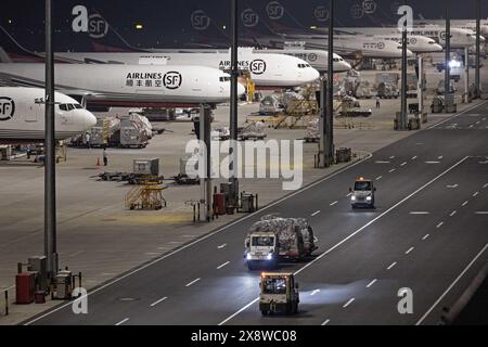 General view of dozens of SF cargo aircrafts line up to be loaded at ...