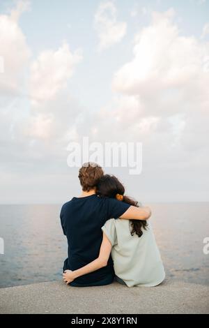 A calm sea under the cloudy sky Stock Photo - Alamy