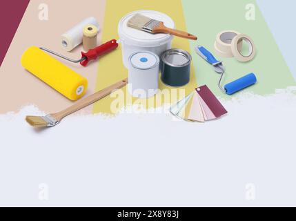 Painting tools and color swatches on a white surface, home renovation ...
