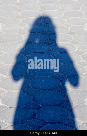 Stone wall with trees with a green tint and in fog Stock Photo - Alamy