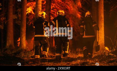 Diverse Squad of Male and Female Firefighters Trail Deep in a Forest to ...