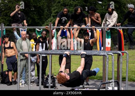 Young calisthenics athletes perform feats of physical strength and ...