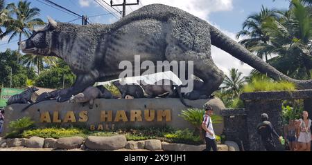 Alas Harum entrance sign in Ubud Bali. A 'Luwak' statue aka Asian Palm ...
