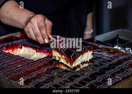 Chef prepares trilece dessert in the kitchen. Turkish Traditional ...