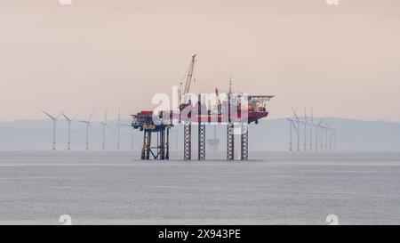 Irish Sea near Merseyside, England, UK - May 17, 2023: An oil rig and ...