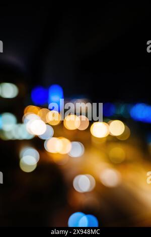 Abstract bokeh background featuring shimmering silver and gray light ...