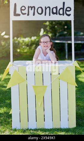 Cute kid girl stand on wooden floor and paper planes flying around ...