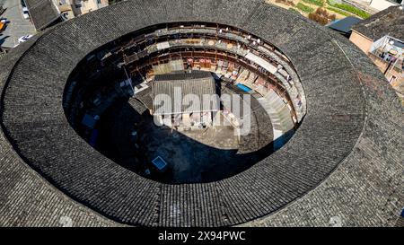 Aerial of Taxia village and Fujian Tulou, rural dwelling of the Hakka ...