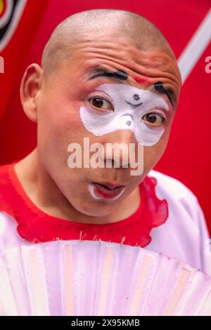 Chinese man with face painting, Chengdu, China Stock Photo - Alamy