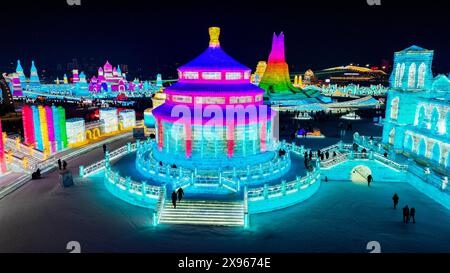 Aerial of the Illuminated buildings made out of ice, Ice International ...