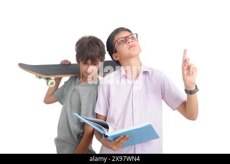 nerd with books and cool kid with skateboard on white background Stock ...