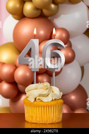 Birthday candle number 46 - Birthday celebration on black background ...