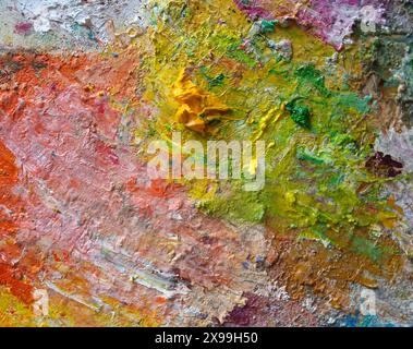 Oil paints mixed together on a palette for the background Stock Photo ...