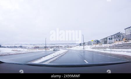 Navigating Through a Snowy Suburban Neighborhood at Dawn Stock Photo ...