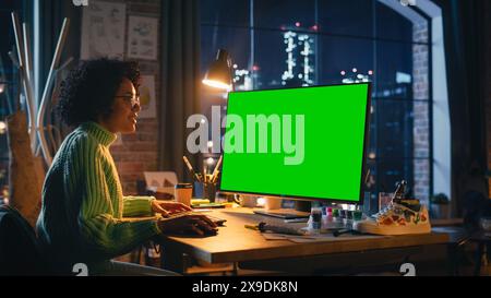 Diverse Professional Freelancer Working on Personal Computer with Green ...