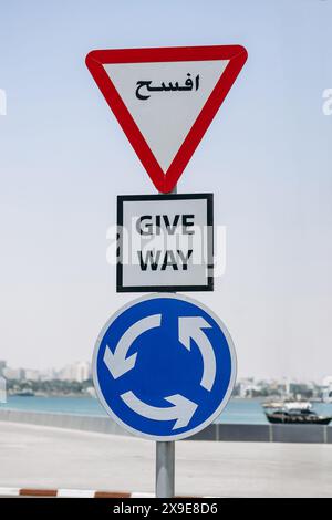 Road sign give way sign, Doha, Qatar Stock Photo - Alamy