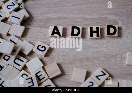 Tile alphabet letter with word disorder in red color rack on wood ...