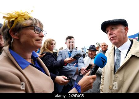 Trainer Karl Burke is interviewed after his horse Fallen Angel won the ...