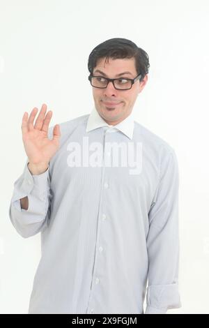 shy and insecure male nerd wearing glasses on white background Stock ...