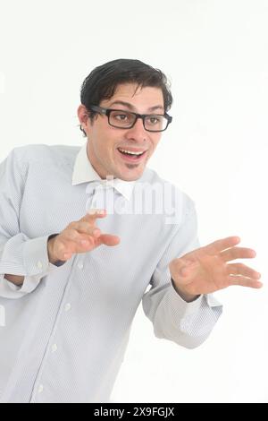 shy and insecure male nerd wearing glasses on white background Stock ...