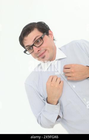 shy and insecure male nerd wearing glasses on white background Stock ...