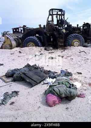 The bodies of dead Iraqis killed in overnight bombings lay on ...