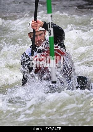 Finn Butcher of New Zealand in action during the Men's kayak cross ...