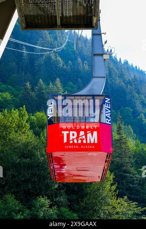 Red gondola of the Goldbelt Tram cable-car ascending Mount Roberts ...