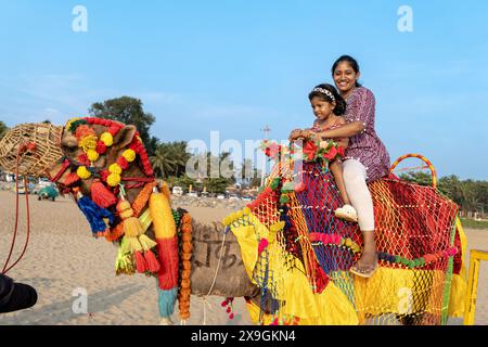 A colorful camel ride by the beach brings mother and daughter closer ...