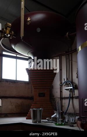 Double distillation process of cognac spirits in Charentias copper ...