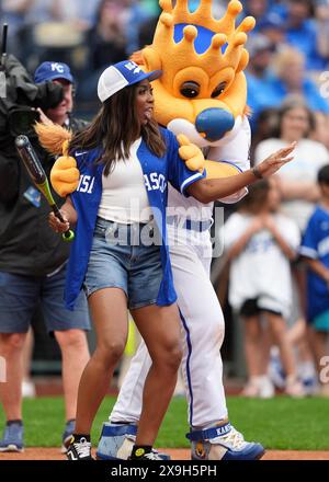 MAY 31, 2024: Royals mascot "Slugger coaches Ego Nwodim at the plate in ...