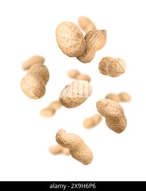 Unpeeled peanuts in air on white background Stock Photo - Alamy