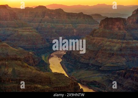 Majestic cliffs of the Grand Canyon illuminated by warm golden sunlight ...