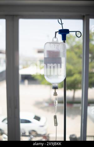 Bottles saline are hung on poles for giving saline patients and passing ...