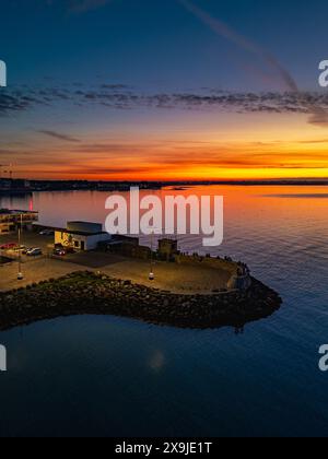 April sunset at Howth Harbour Stock Photo - Alamy