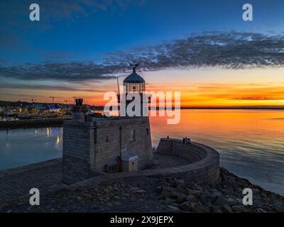 April sunset at Howth Harbour Stock Photo - Alamy