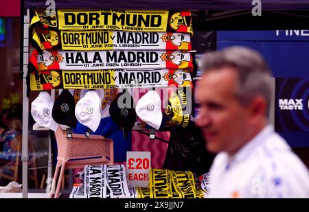 A merchandise stall selling scarves ahead of the UEFA Champions League ...