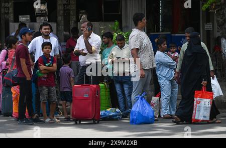 MUMBAI, INDIA - JUNE 1: Passengers are awaiting a taxi outside Dadar ...