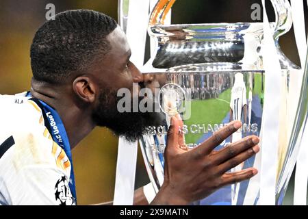 Real Madrid's Antonio Rudiger kisses the trophy after winning the UEFA ...