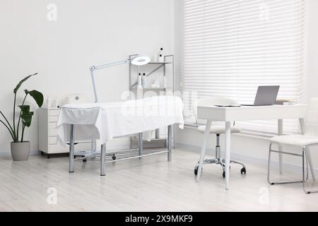 Modern interior of dermatologist's office with examination table Stock ...