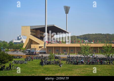urban infrastructure, Pyongyang residents at the stadium, parking Stock ...