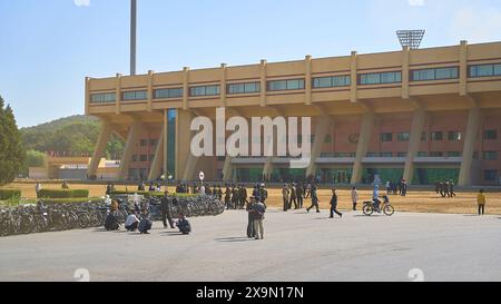 urban infrastructure, Pyongyang residents at the stadium, parking Stock ...